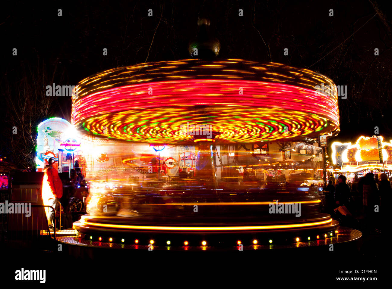 long exposure pictures of amusement park rides and wheels at night ...