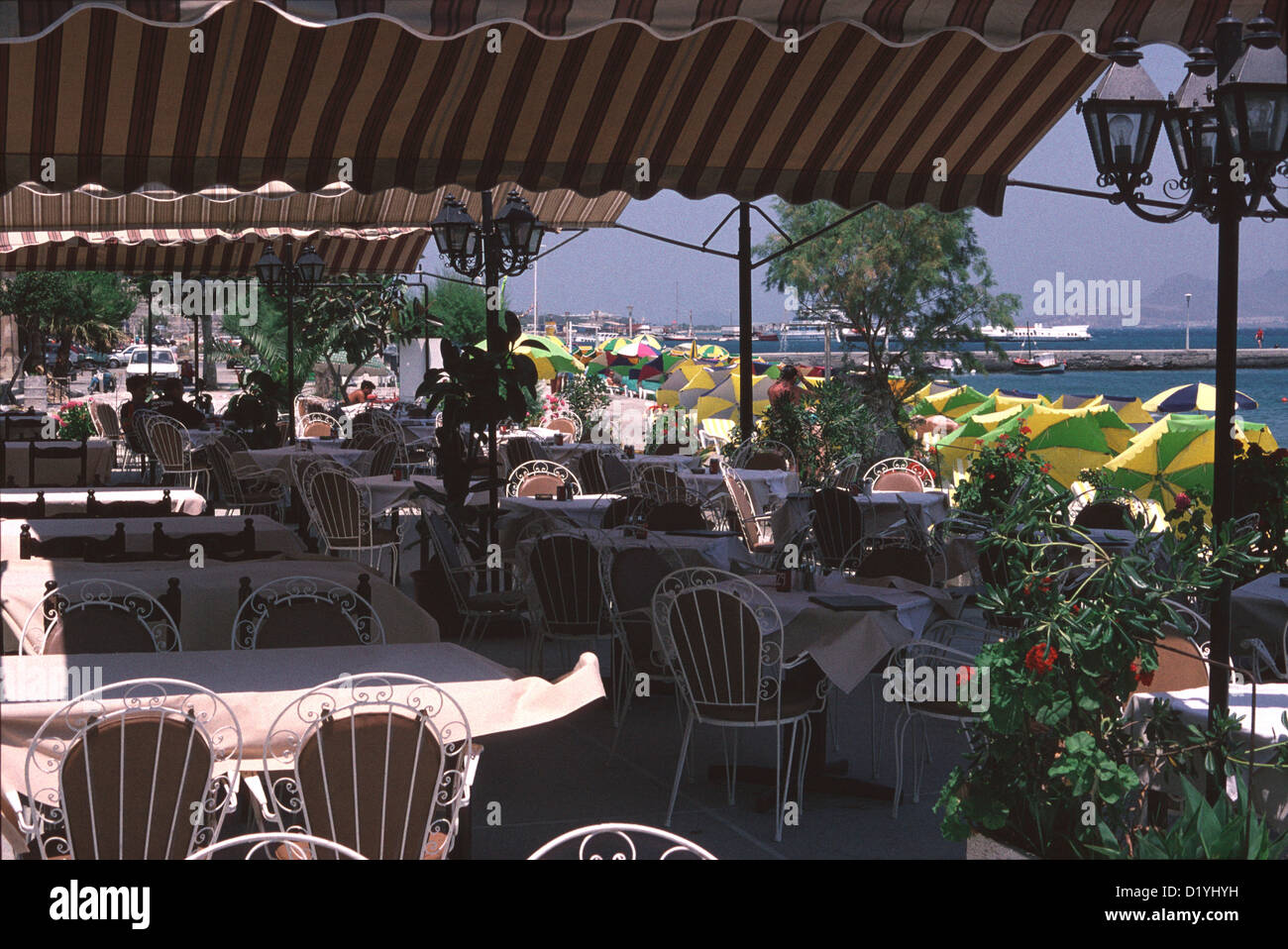 Cafe at Kos Town waterfront Kos Greece Stock Photo - Alamy