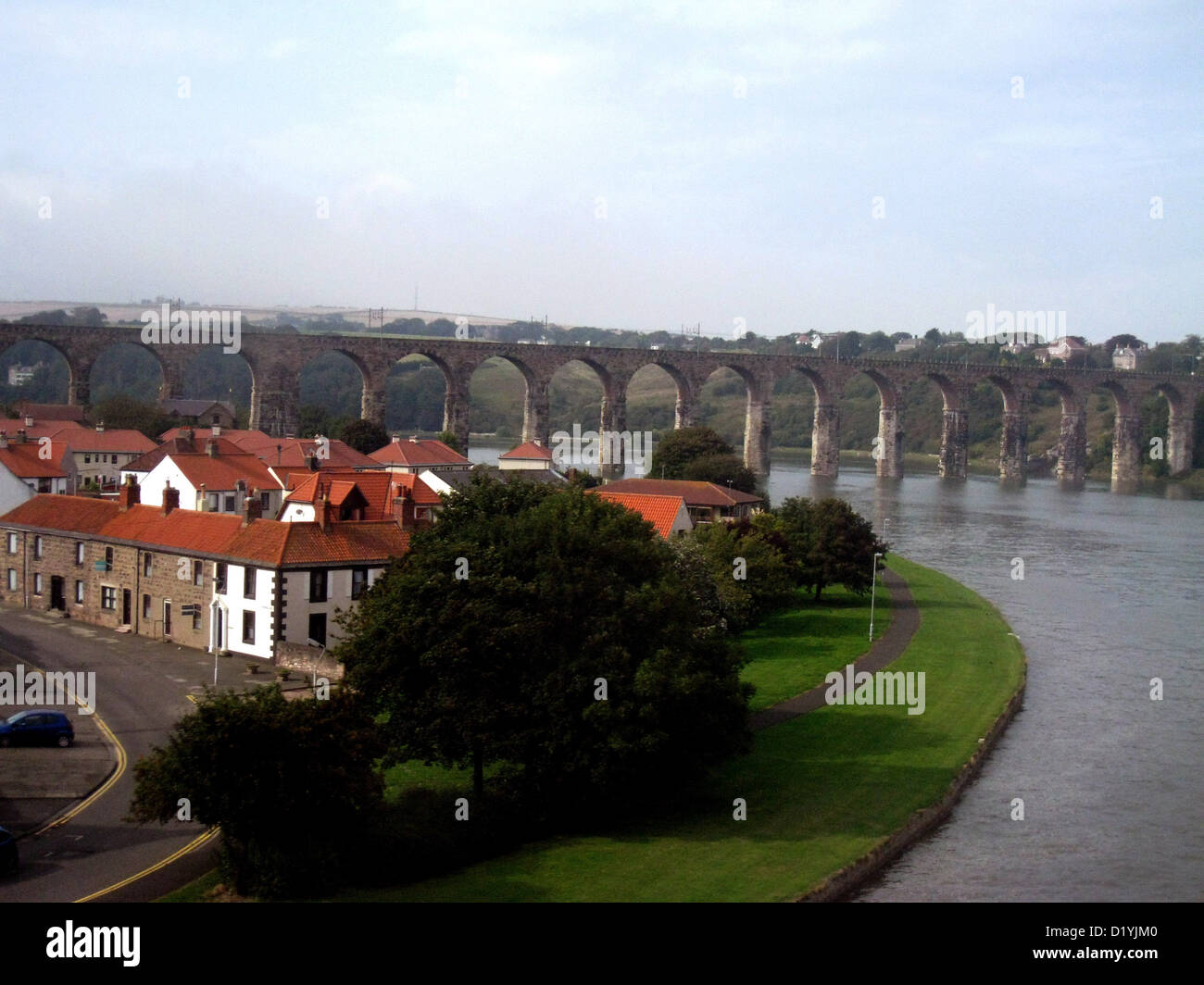 Rail viaduct over river in picturesque northern town Stock Photo - Alamy