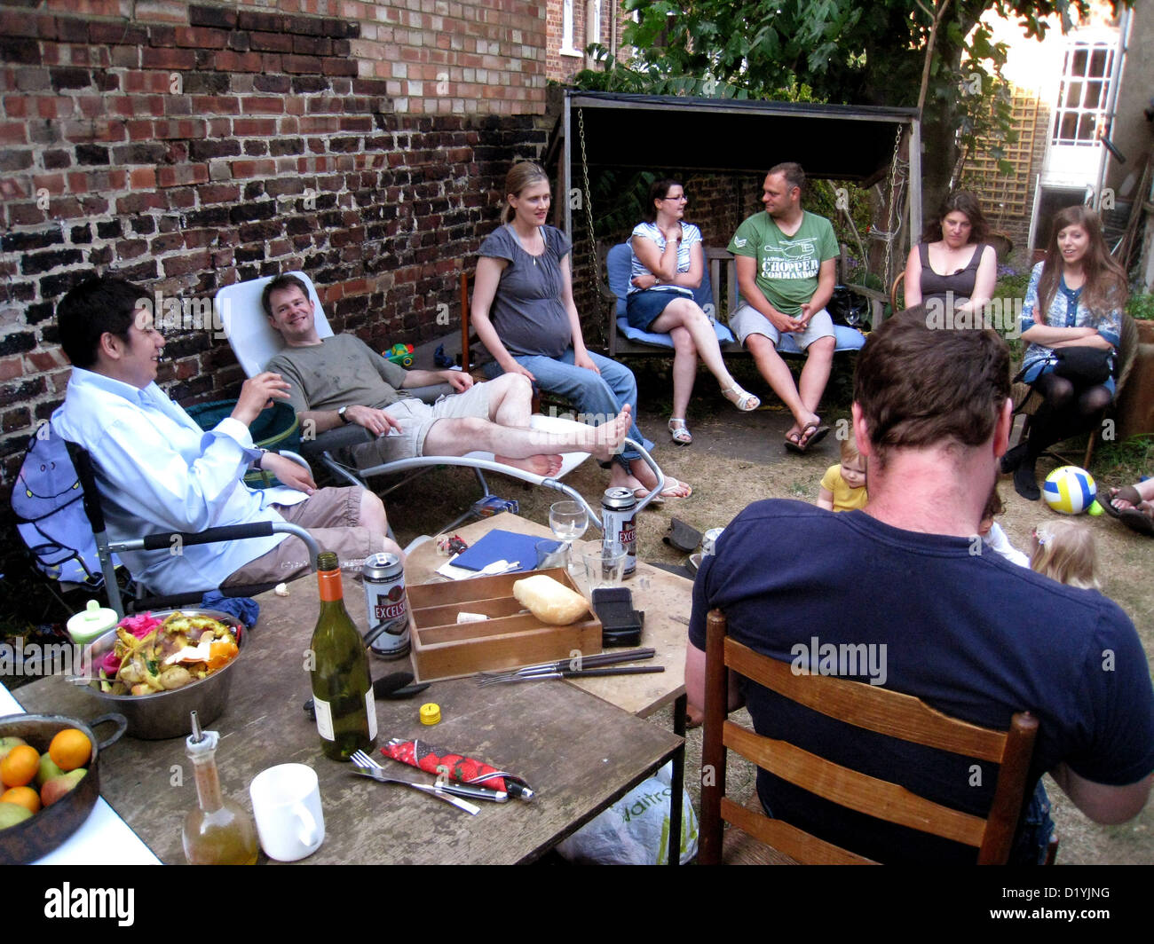 family gathering in garden in summer with children Stock Photo - Alamy