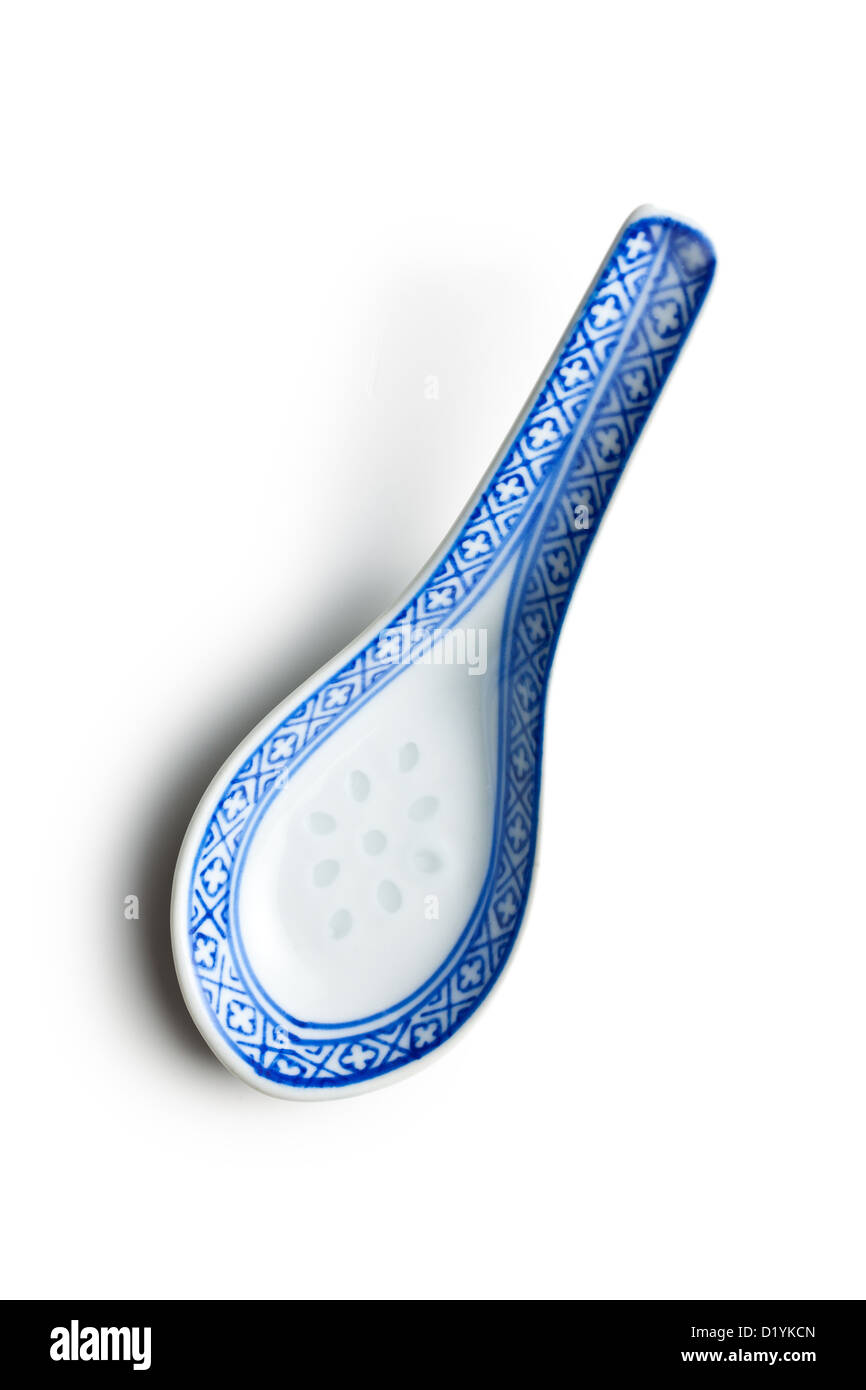 Chinese ceramic spoon on white background Stock Photo - Alamy