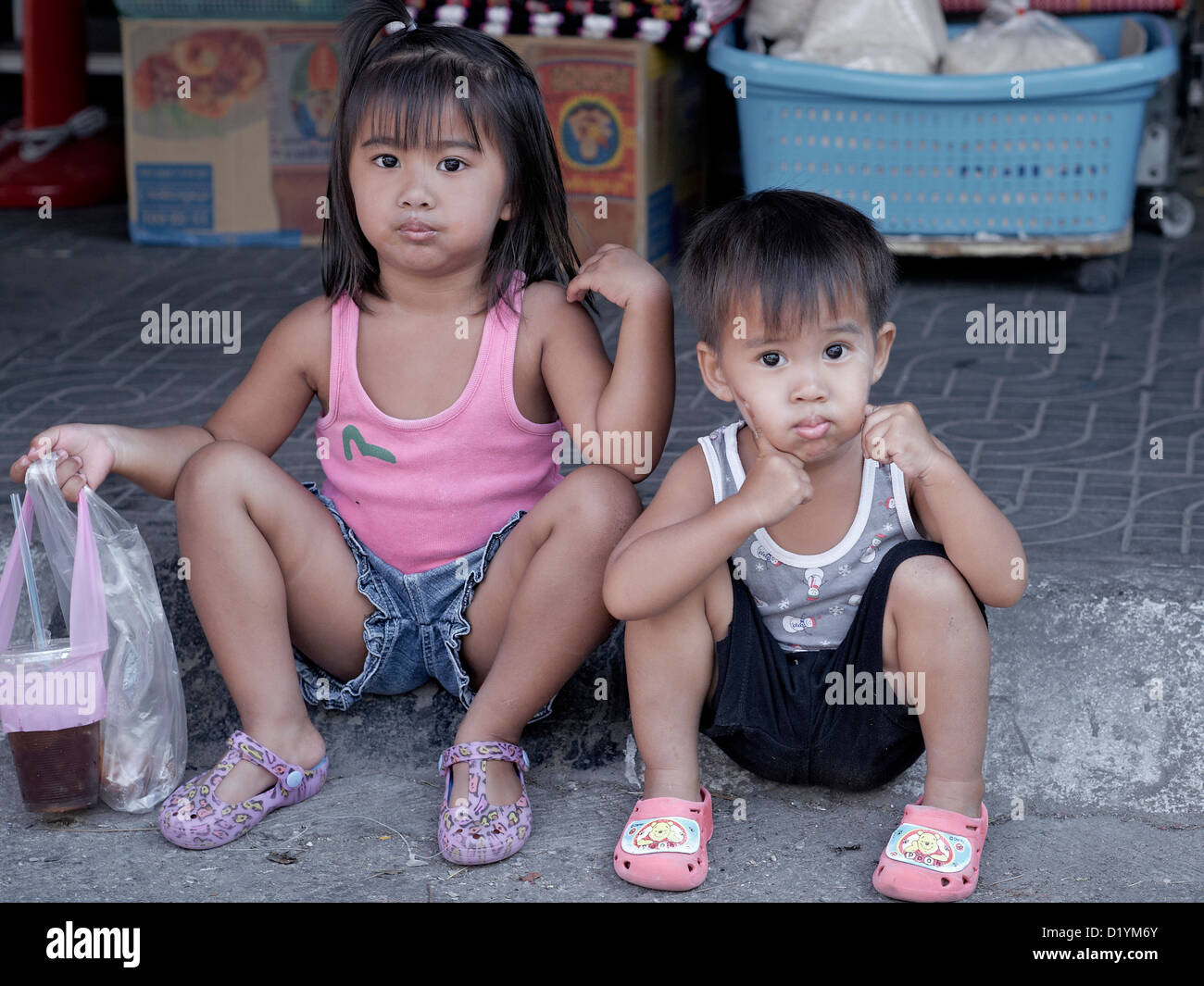 Thai children: 3 year sister and 2 year old brother. Thailand S. E ...