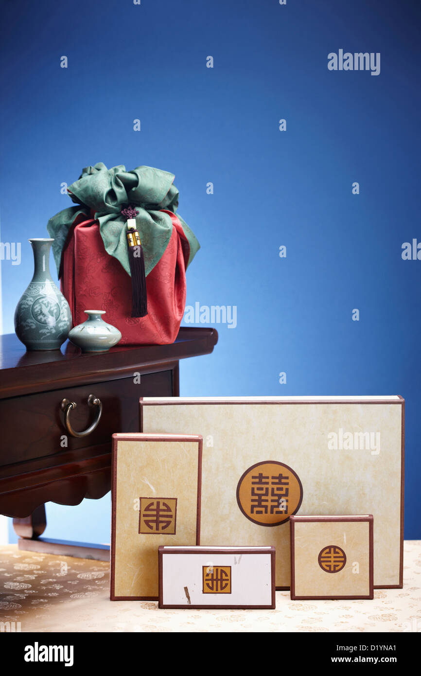 Korean boxes and a package in Korean traditional wrap with ceramics on ...