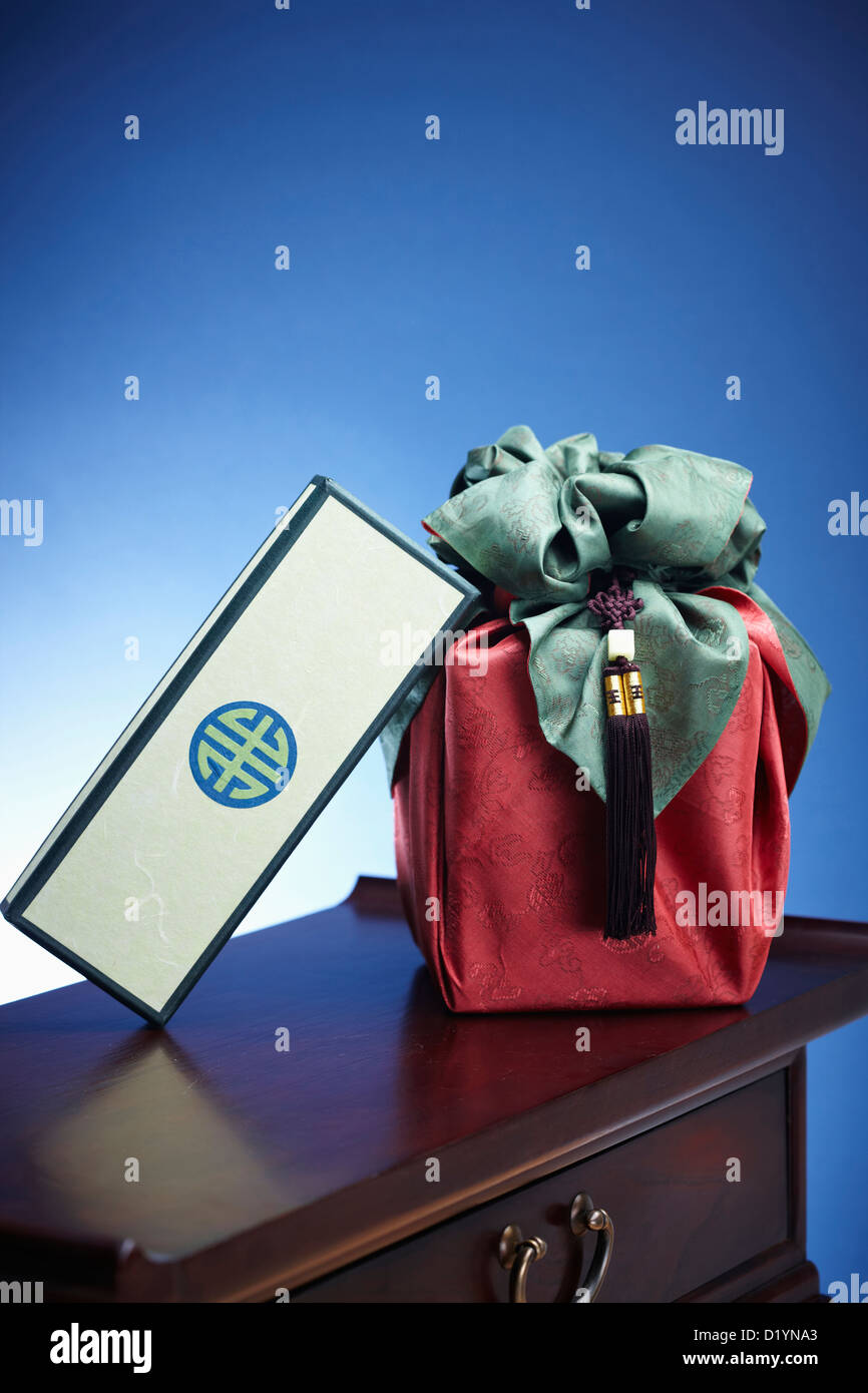 Korean box leaning on a package in Korean traditional wrap Stock Photo ...
