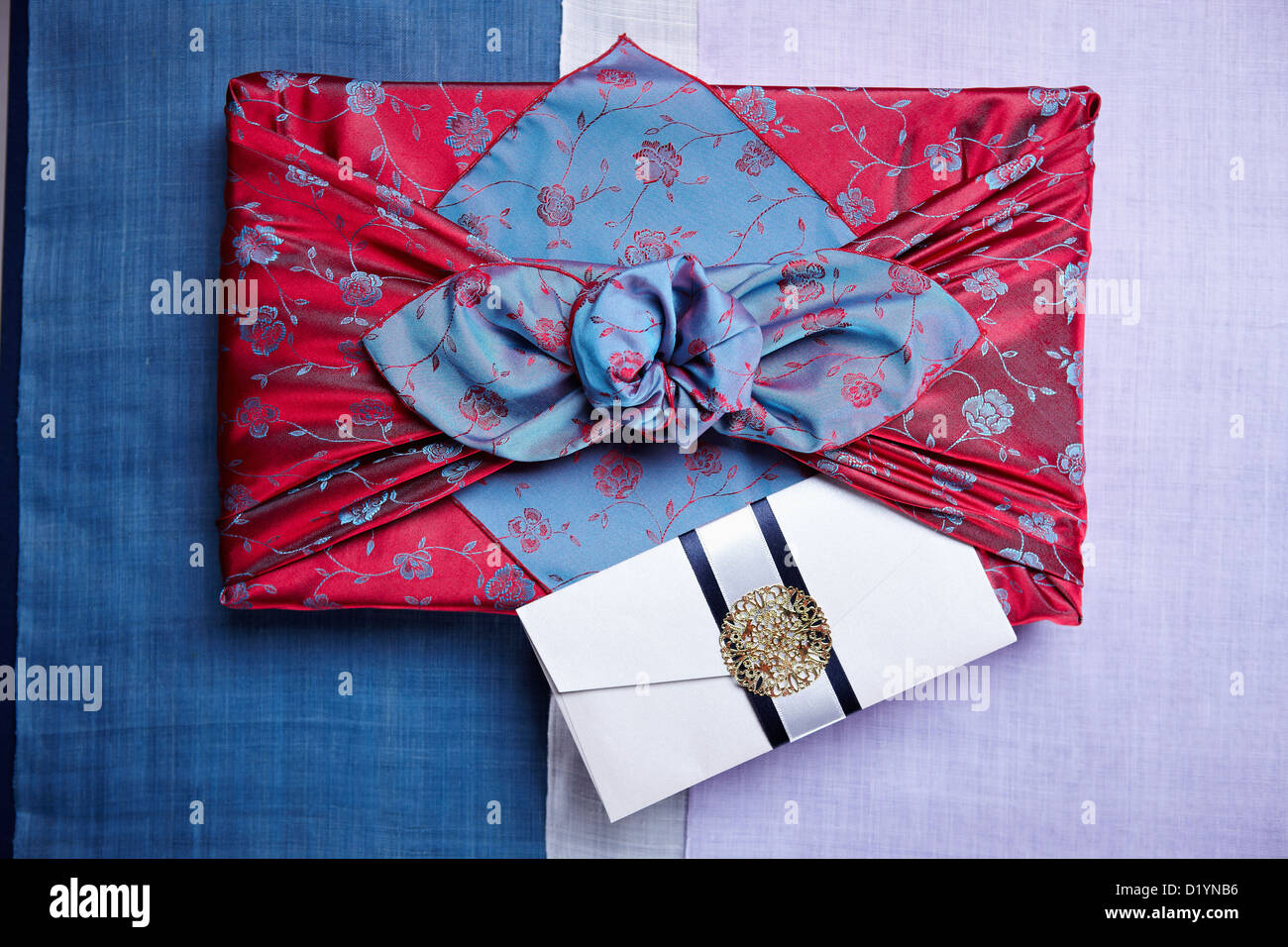 a package in Korean traditional wrap and an envelope on traditional ...