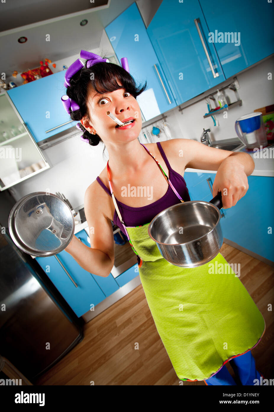 crazy housewife in an interior of the kitchen Stock Photo - Alamy