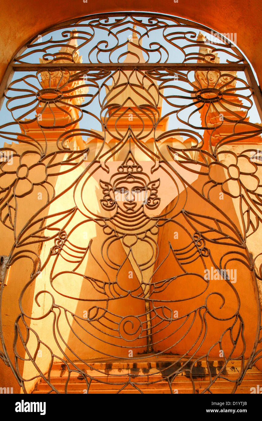 Decorative arched gate on the stairway of Pha That Luang, Vientiane ...
