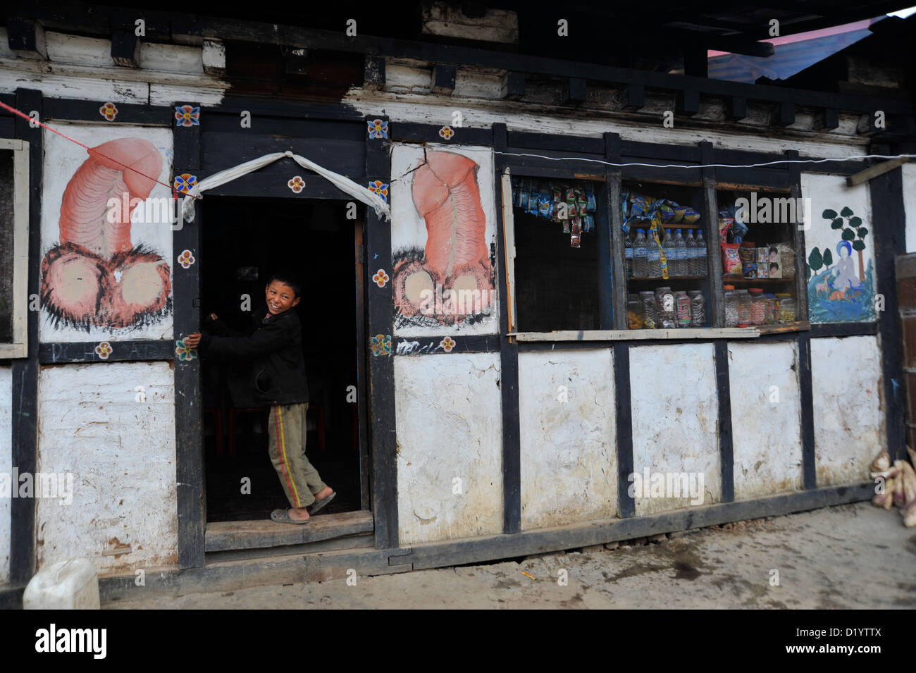 a boy going into a shop to buy something Stock Photo - Alamy