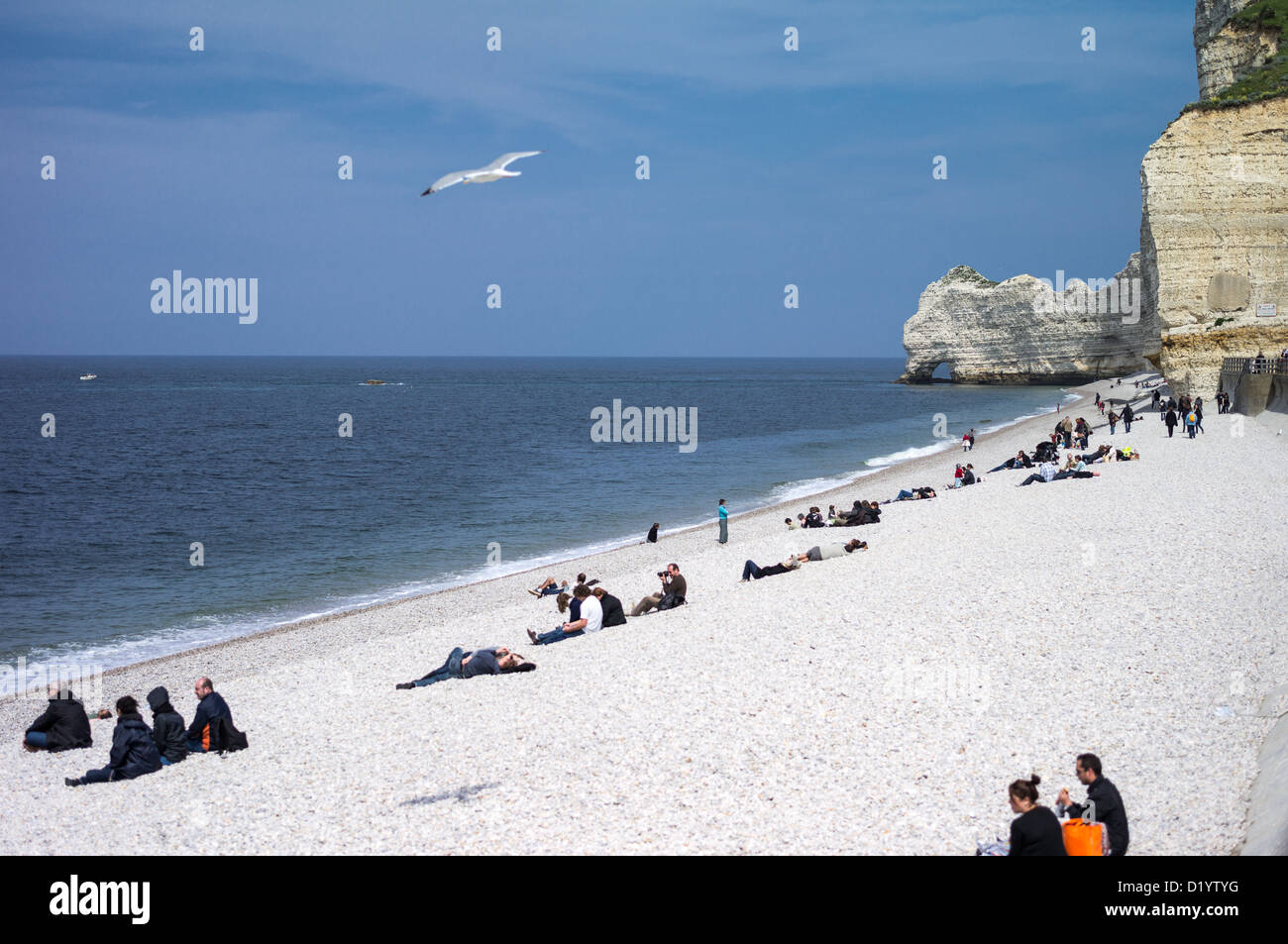 France, Normandy, people in the beach with cliffs of Etretat Stock ...