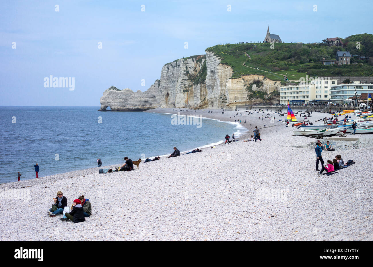 France, Normandy, people in the beach with cliffs of Etretat Stock ...