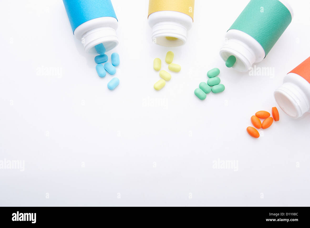 colourful drugs from bottles in different colours Stock Photo - Alamy