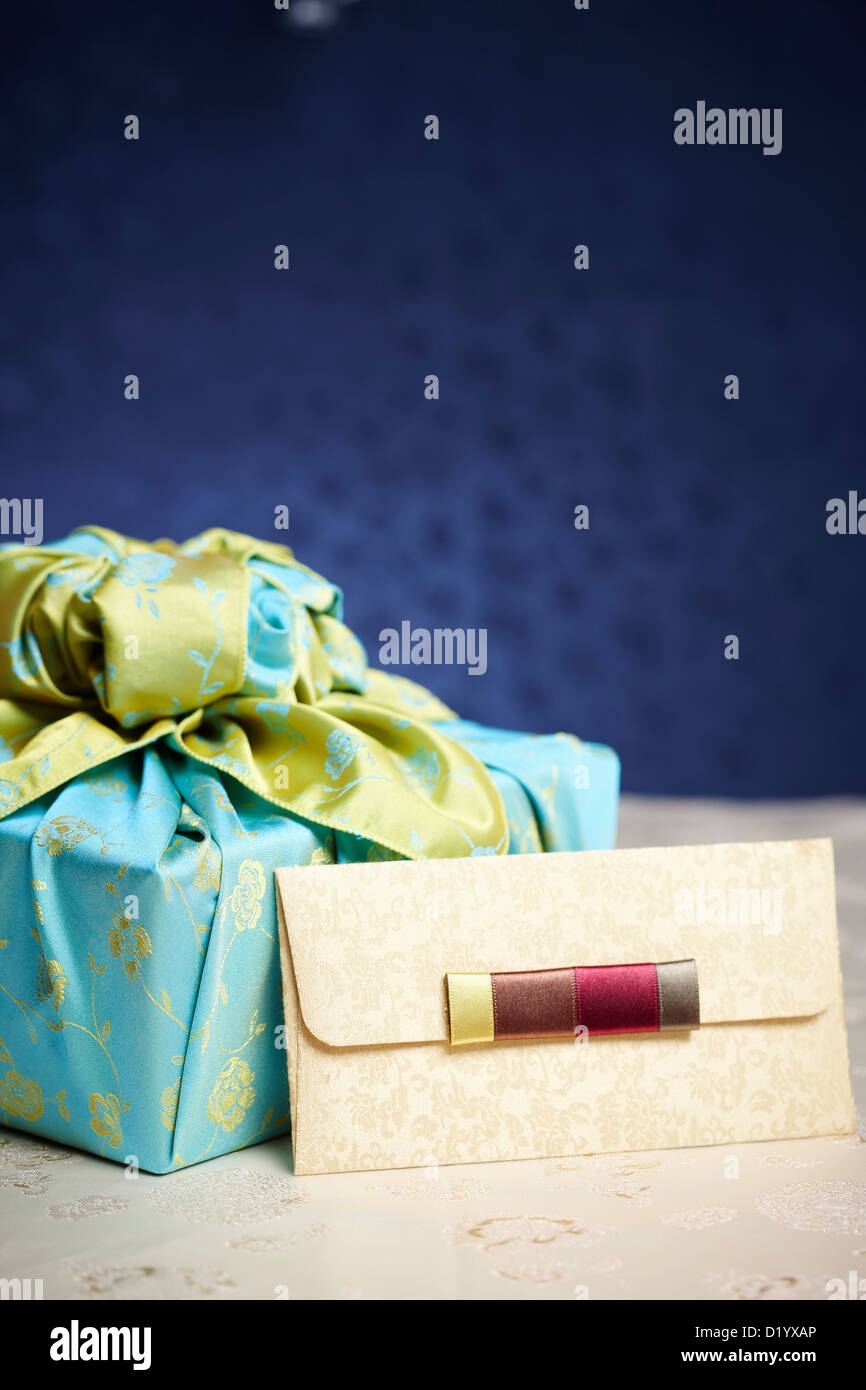 Korean traditional envelope next to a package wrapped in traditional ...