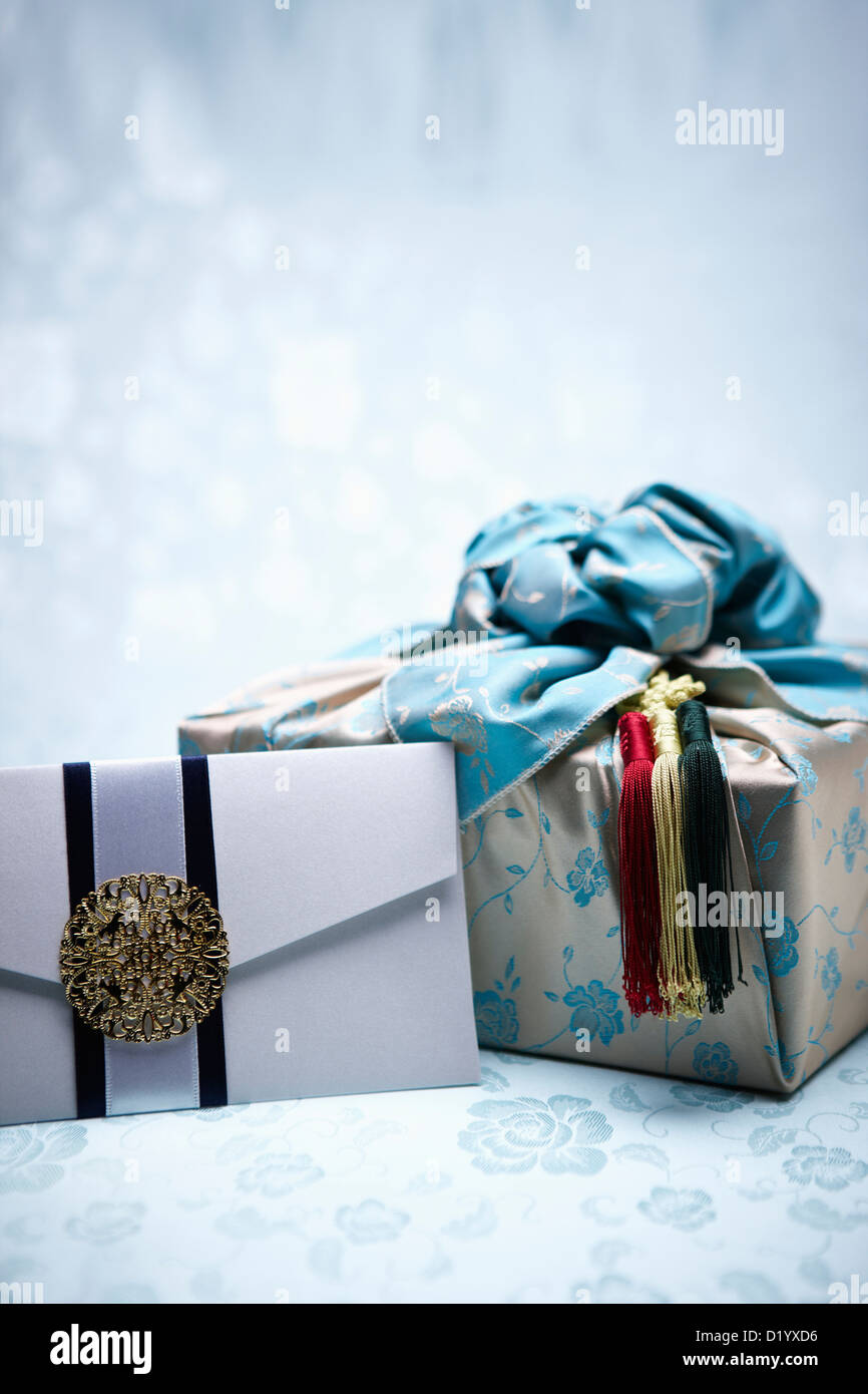 Korean traditional envelope and a package wrapped in a traditional wrap ...