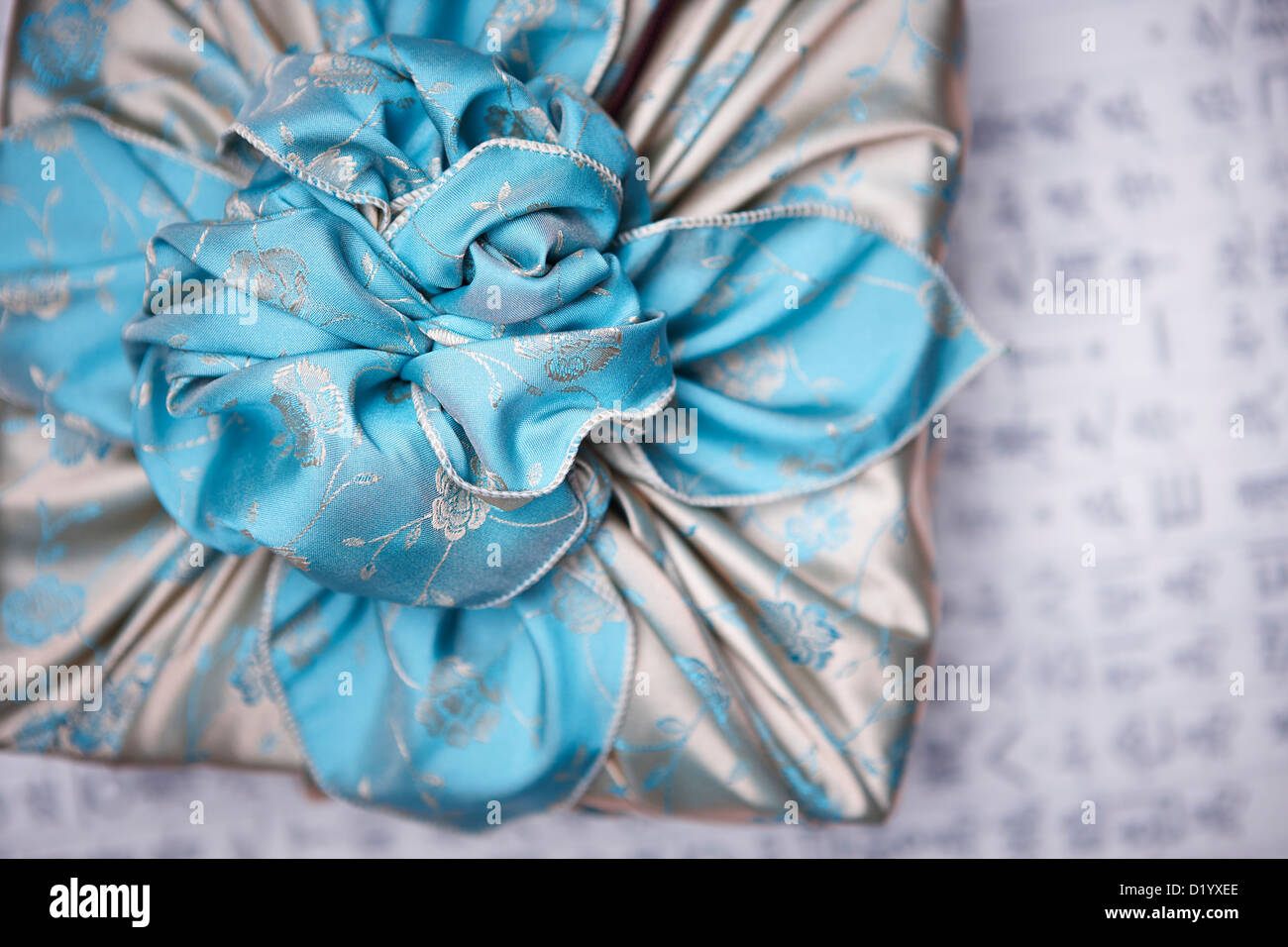a package wrapped in a traditional wrap with nice big ribbon Stock ...