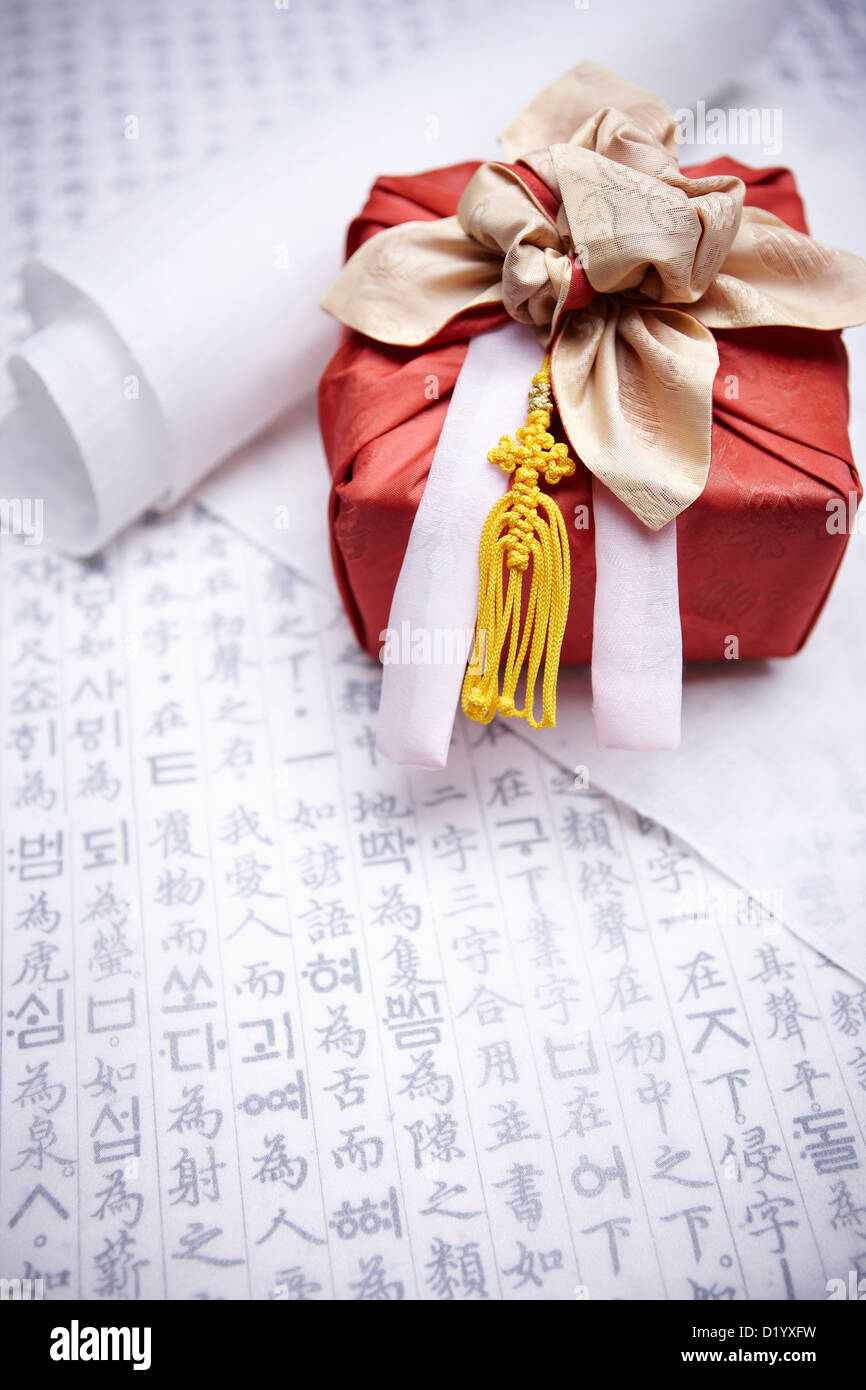 traditional paper and a package wrapped in a traditional wrap Stock ...