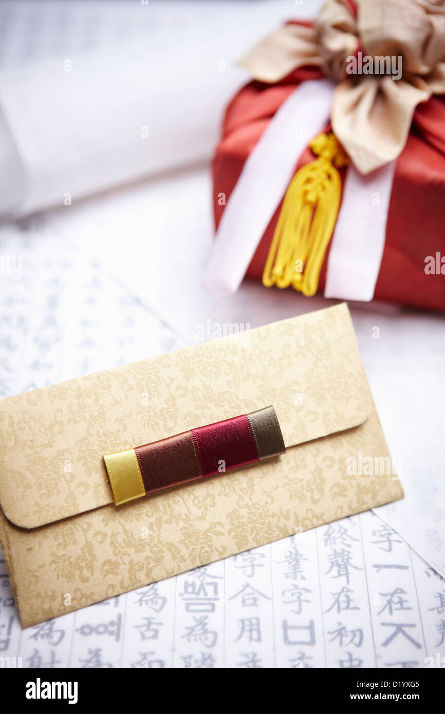 a package wrapped in a traditional wrap between a envelope and ...