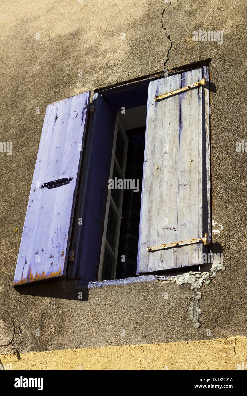 Window with shutters on a medieval house in Gruissan, Southern France ...