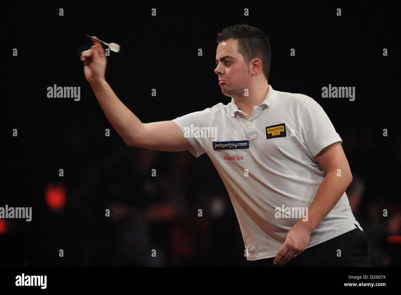 09.01.2013 Frimley Green, England. Jan Dekker in action against Garry ...