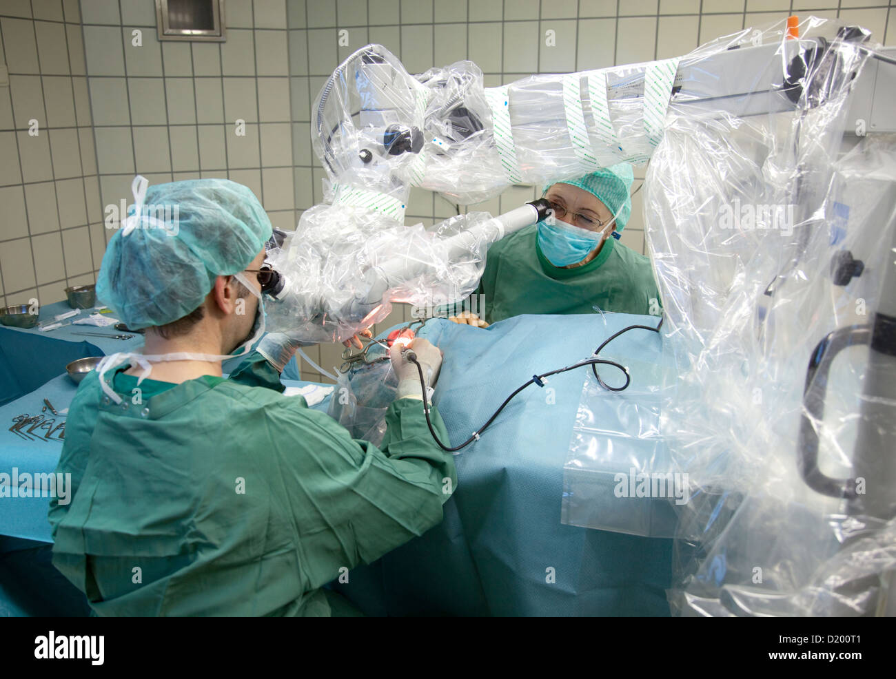 Essen, Germany, an ENT surgeon in the operating room during a surgery ...