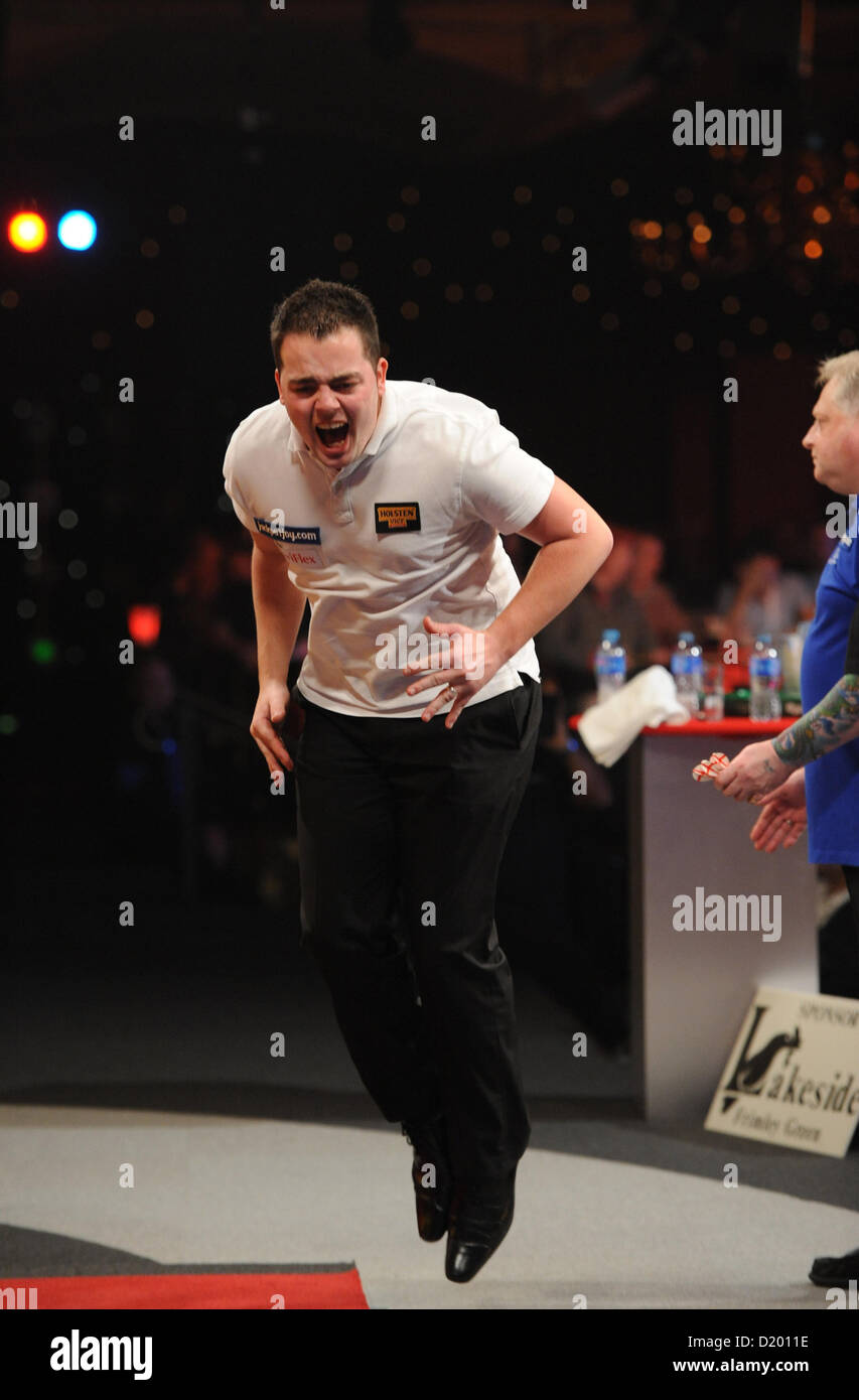 09.01.2013 Frimley Green, England. Jan Dekker celebrates victory ...