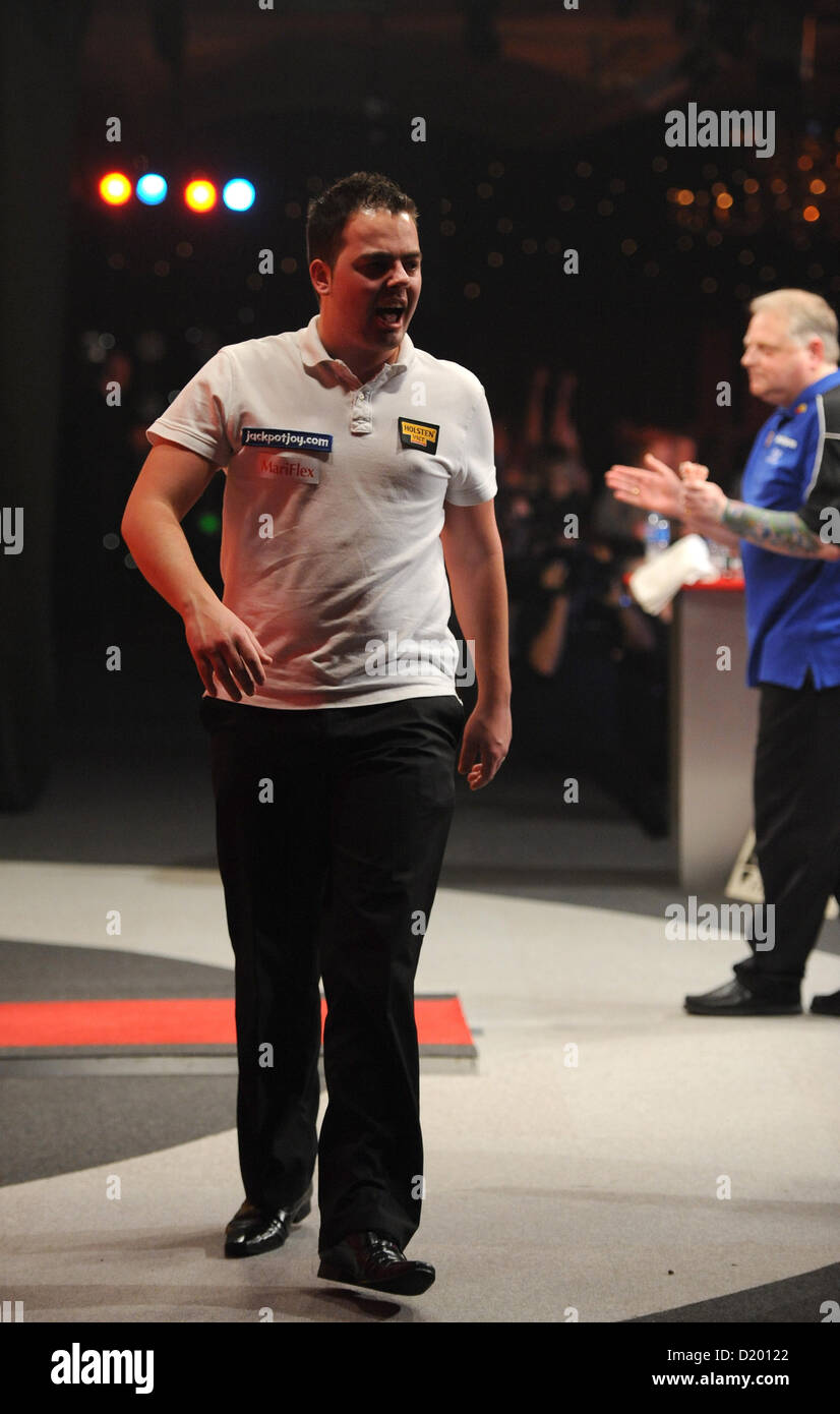 09.01.2013 Frimley Green, England. Jan Dekker celebrates victory ...