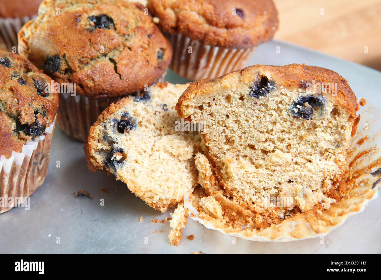 Fresh baked golden blueberry muffins Stock Photo - Alamy