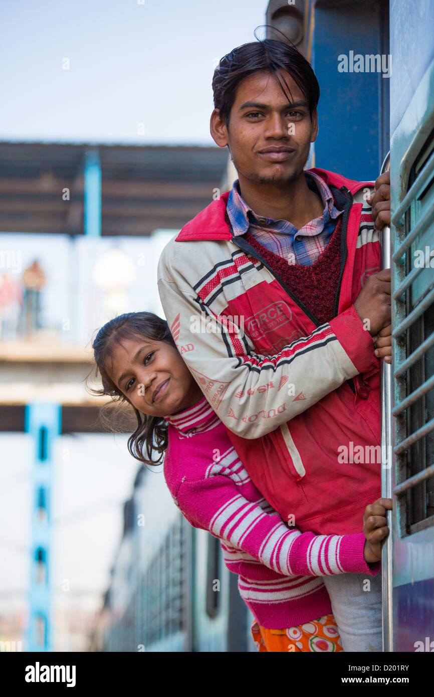 Brother and sister on a train in the New Delhi Railway Station, New ...