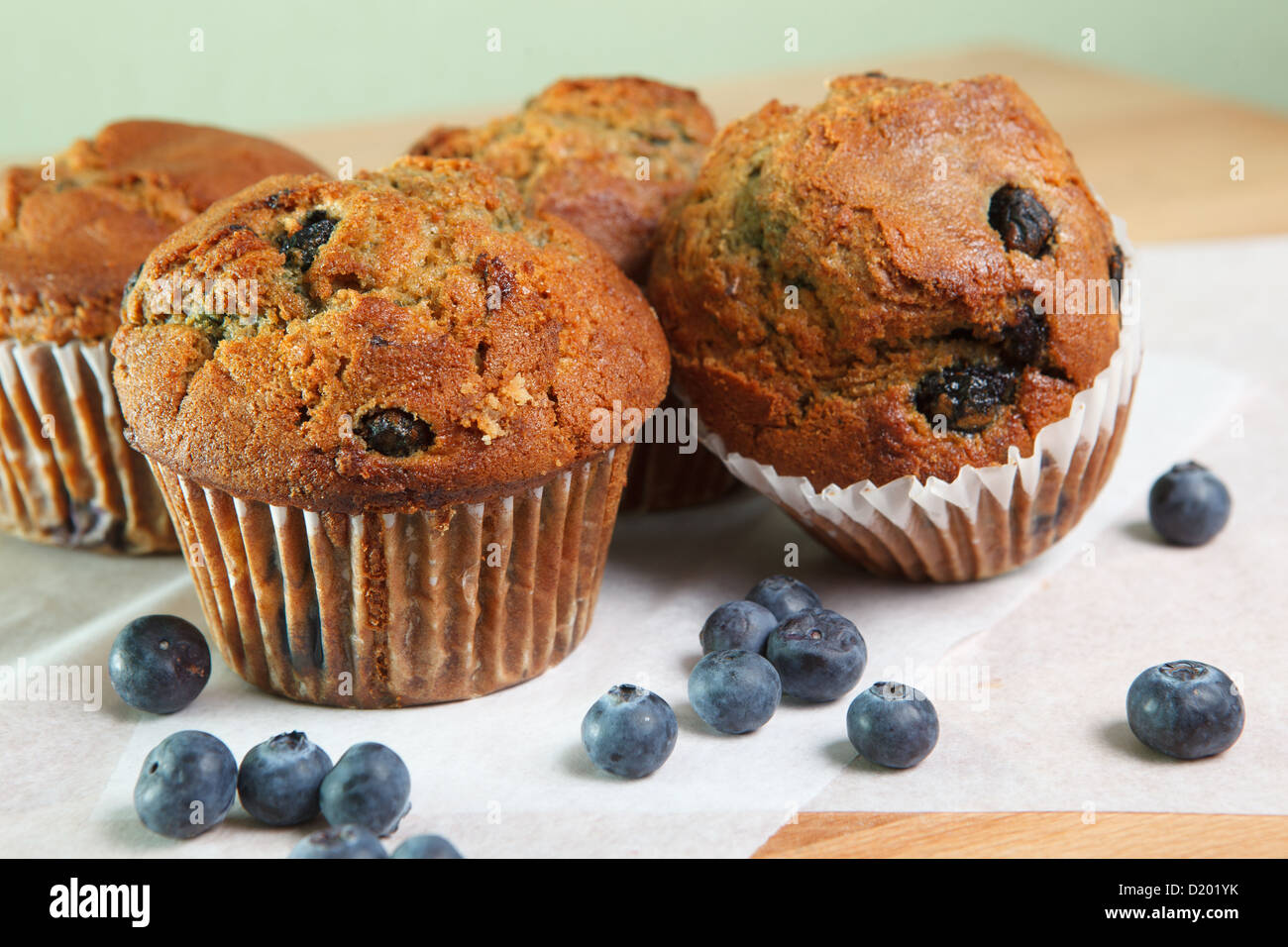 Fresh baked golden blueberry muffins Stock Photo - Alamy