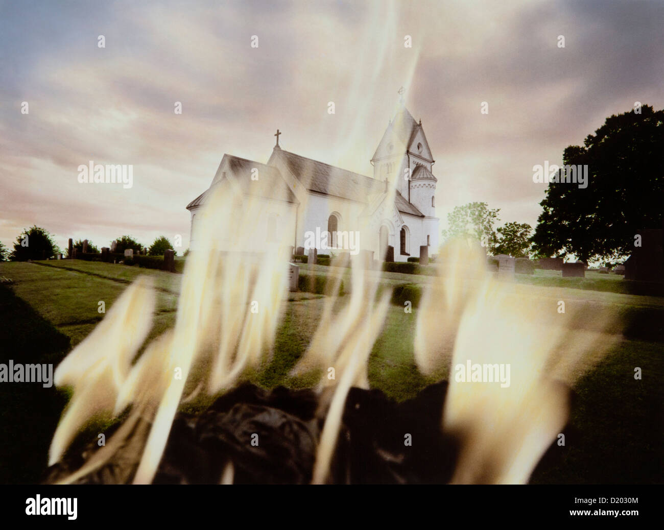 Fire in front of a church, Skane, Sweden, Europe Stock Photo - Alamy