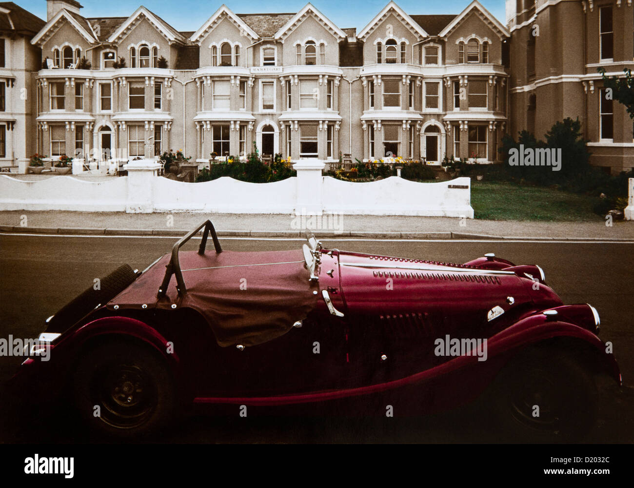Vintage car in front of terrace houses, Torquay, Devon, Southern ...