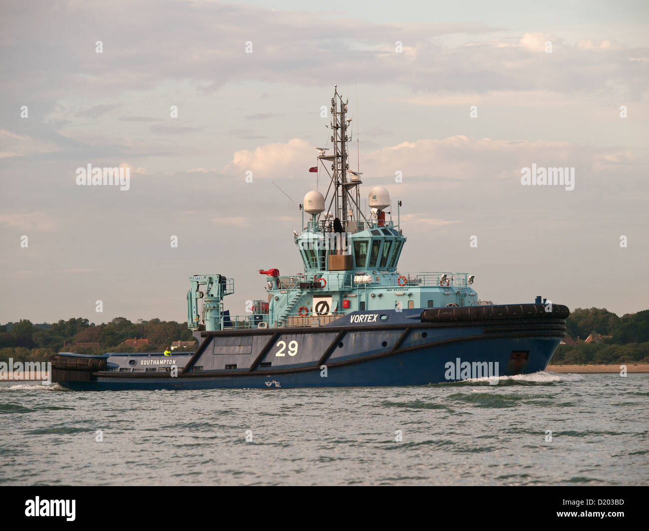 Tug Vortex passing Calshot Spit Southampton Hampshire England UK Stock ...