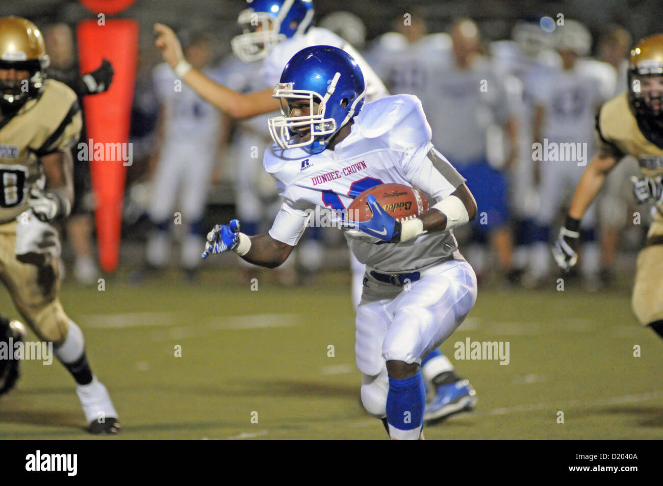 Football Running back finds some open space for a big gain during a ...
