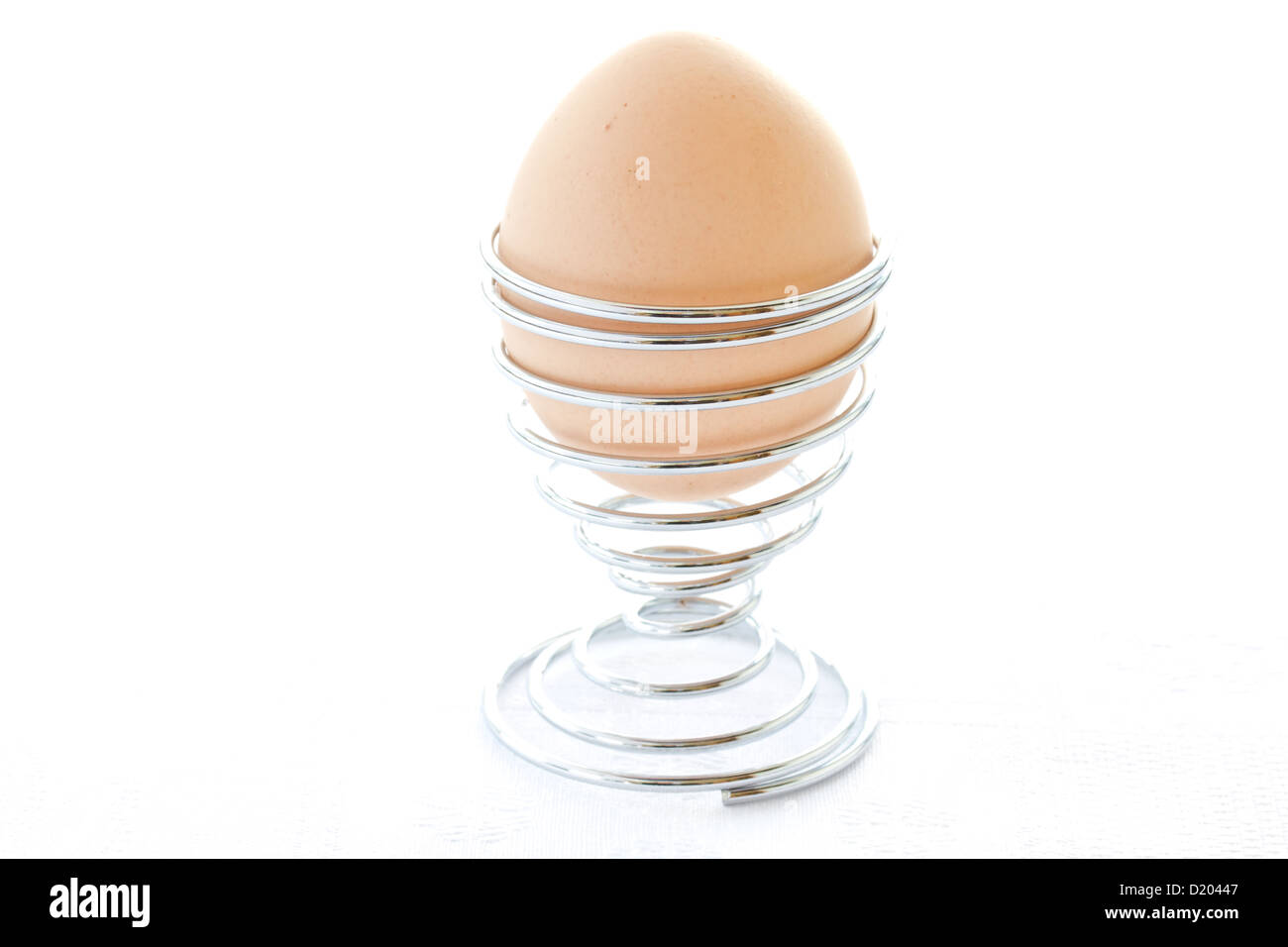 boiled egg on a stand on a light background Stock Photo - Alamy