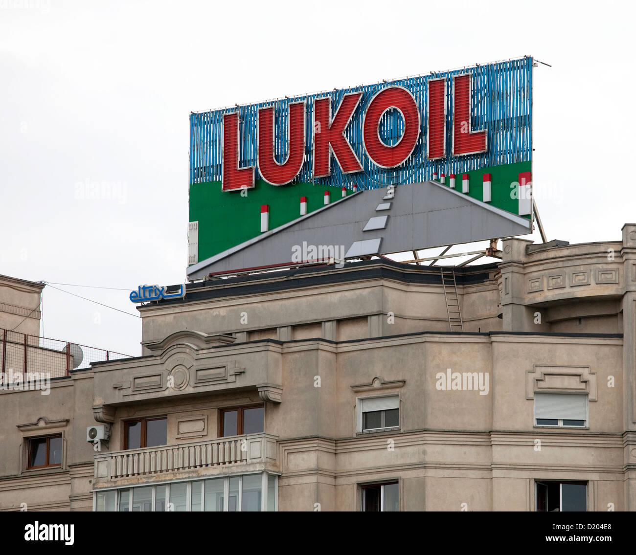 Bucharest, Romania, a facade advertising of Lukoil on a residential ...
