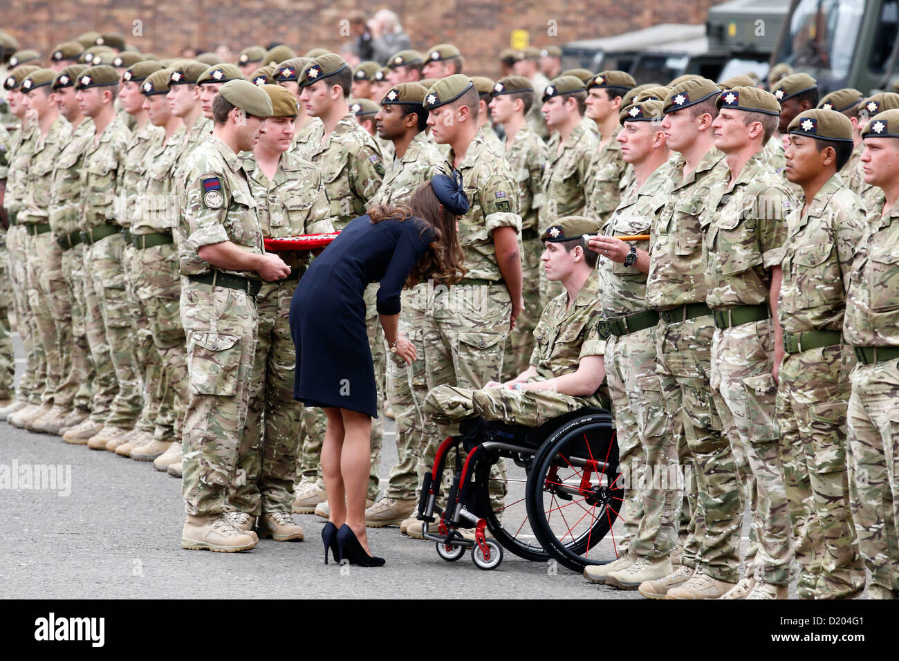 The Duchess of Cambridge, Kate Middleton, hands out operational medals ...