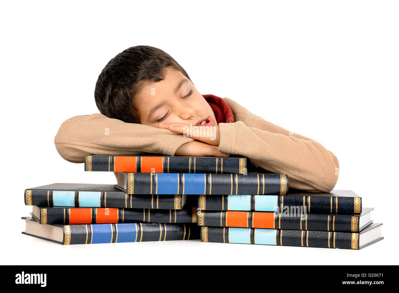 Young boy sleeping over books isolated in white Stock Photo - Alamy