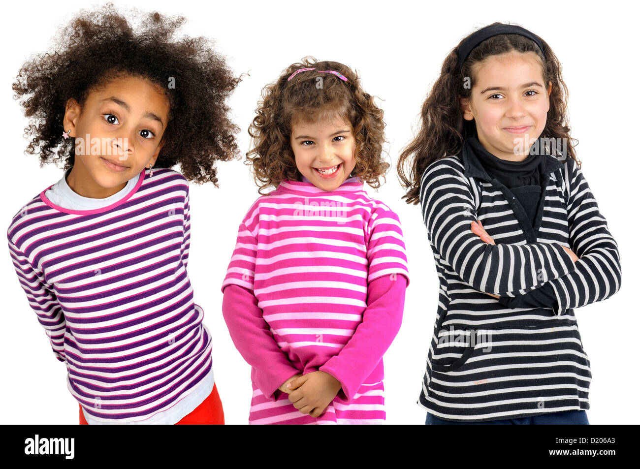 Group of young girls posing isolated in white Stock Photo - Alamy