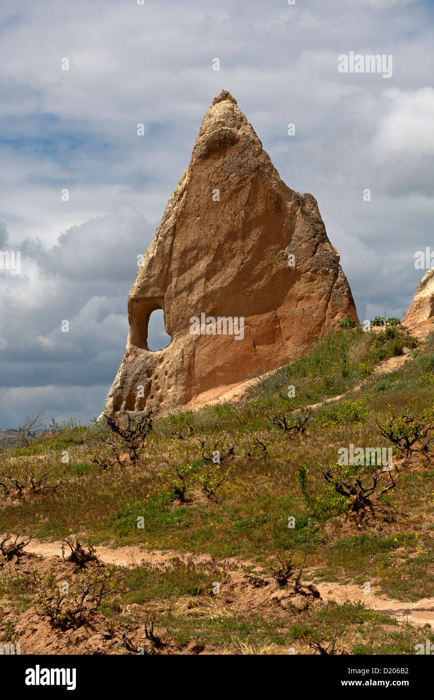 Eroded tuff cone with a hole, Rose Valley, Goereme National Park ...