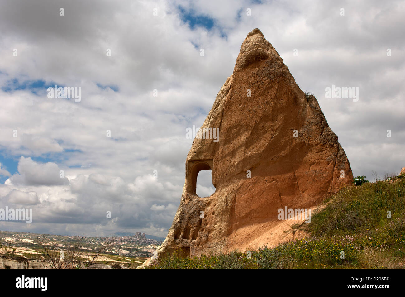 Eroded tuff cone with a hole, Rose Valley, Goereme National Park ...