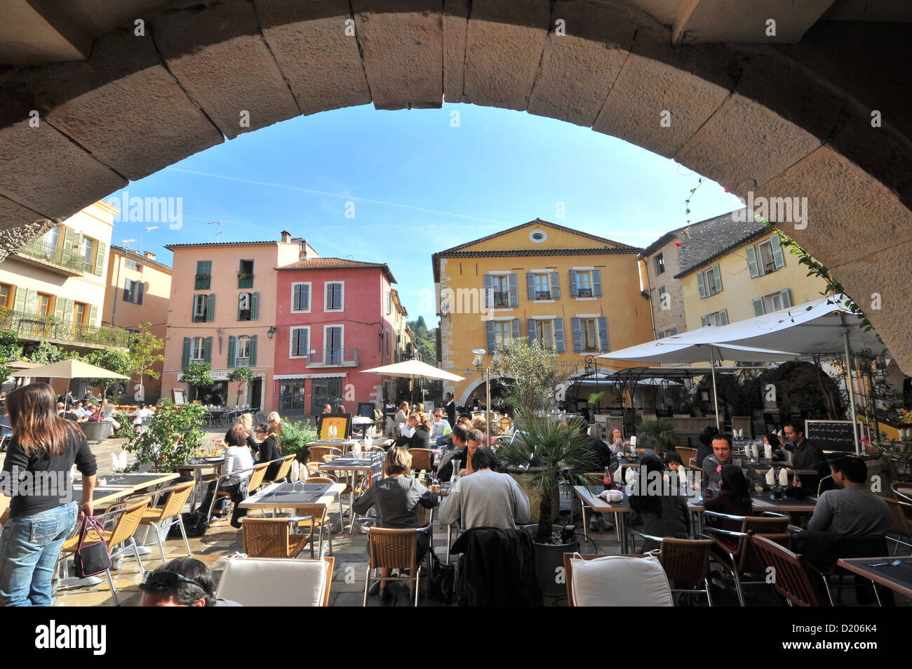 Cafes and restaurants at the marketplace in Valbonne, Cote d'Azur ...