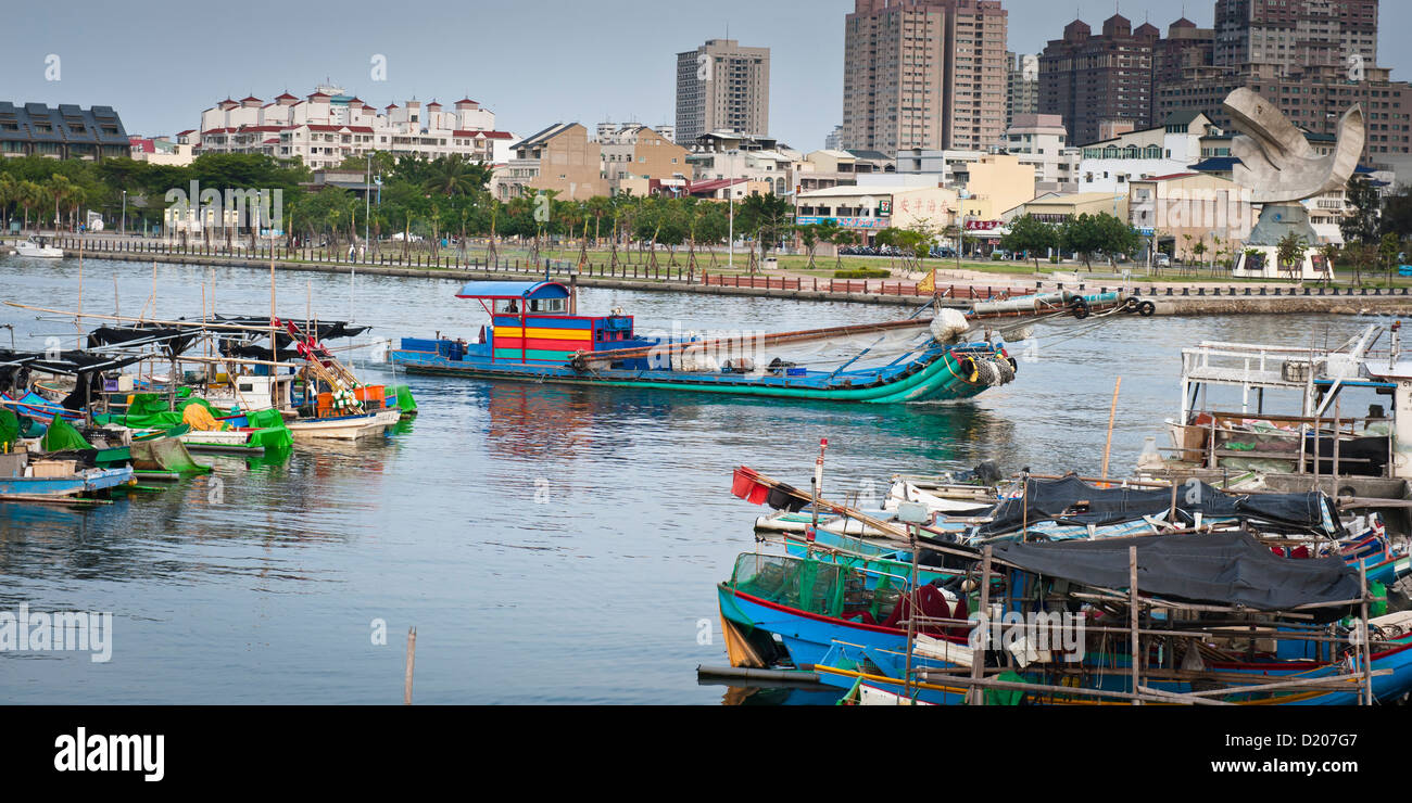 Work boat leaving harbor, Tainan Stock Photo - Alamy