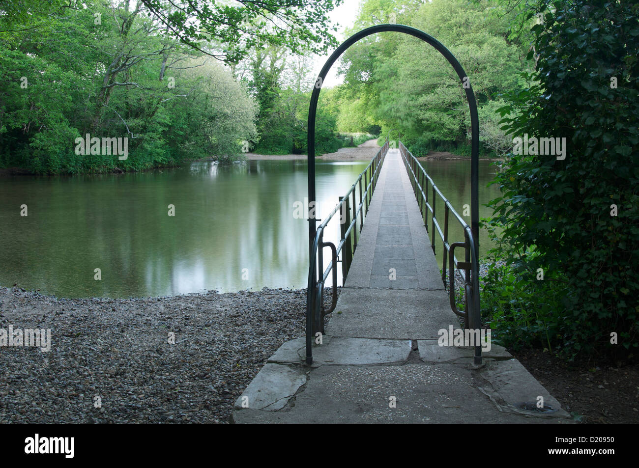 A tranquil summer evening by the ford at Moreton. A long pedestrian ...