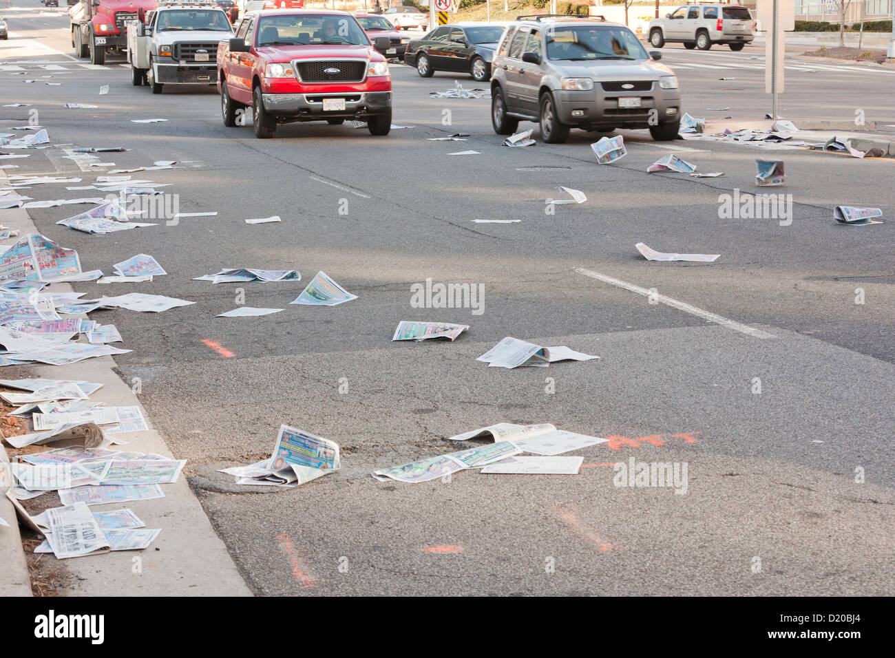 Road littered with newspapers - USA Stock Photo - Alamy