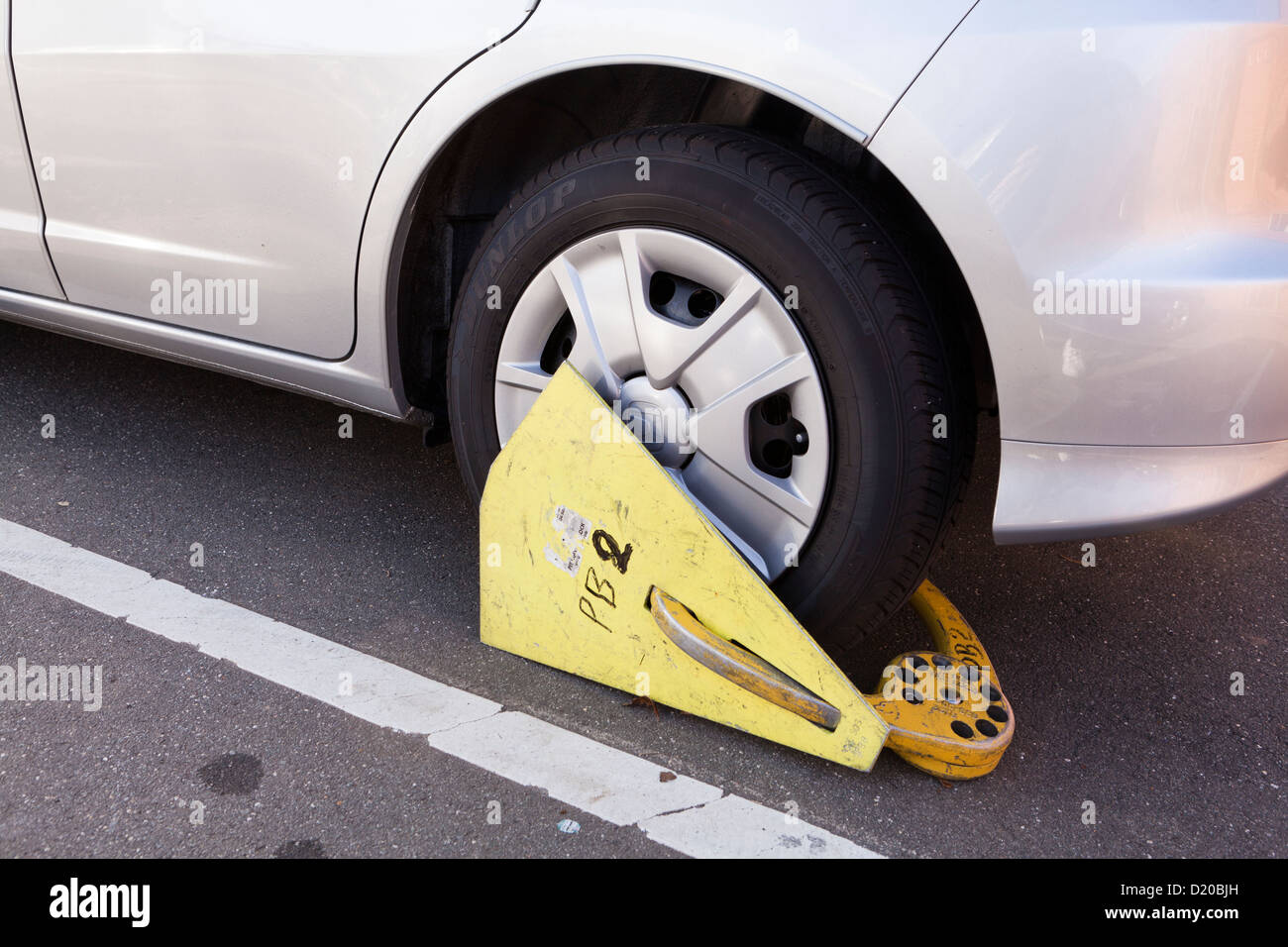 Wheel clamp hi-res stock photography and images - Alamy