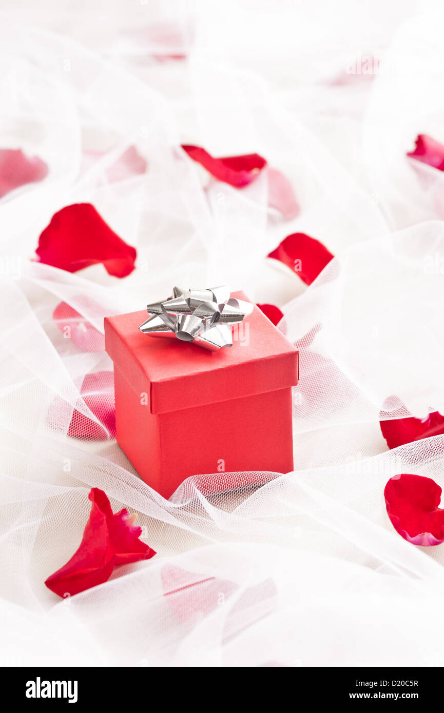 red present with silver bow Stock Photo - Alamy