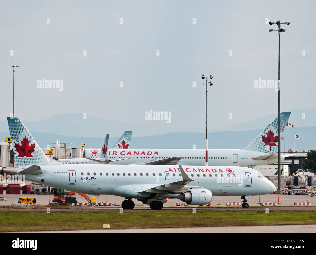 Several Air Canada jets on the tarmac at Vancouver International ...