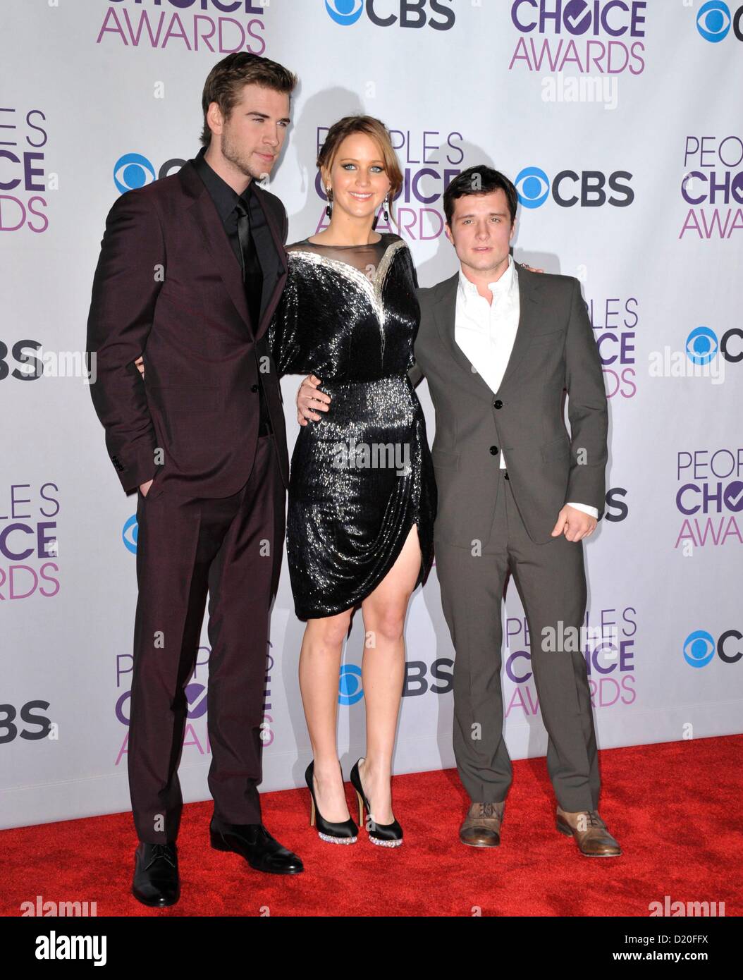 Liam Hemsworth,Jennifer Lawrence,Josh Hutcherson in the press room for ...
