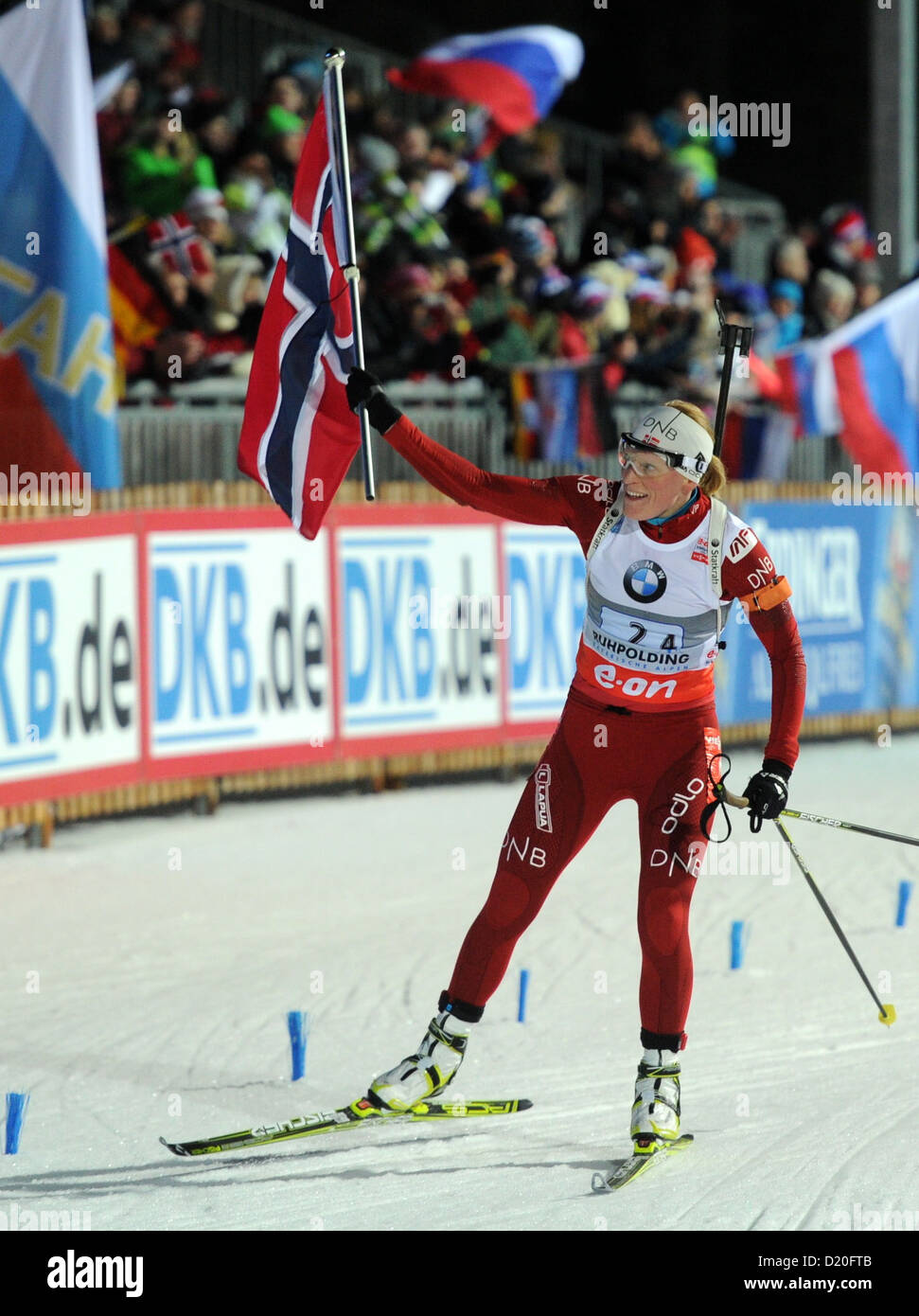 Norwegian biathlete Tora Berger crosses the finishing line of the women ...
