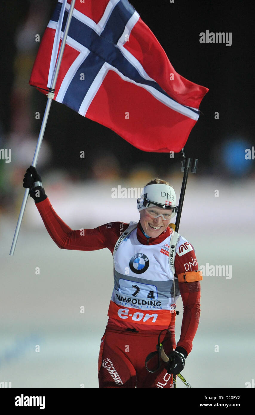 Norwegian biathlete Tora Berger crosses the finishing line of the women ...