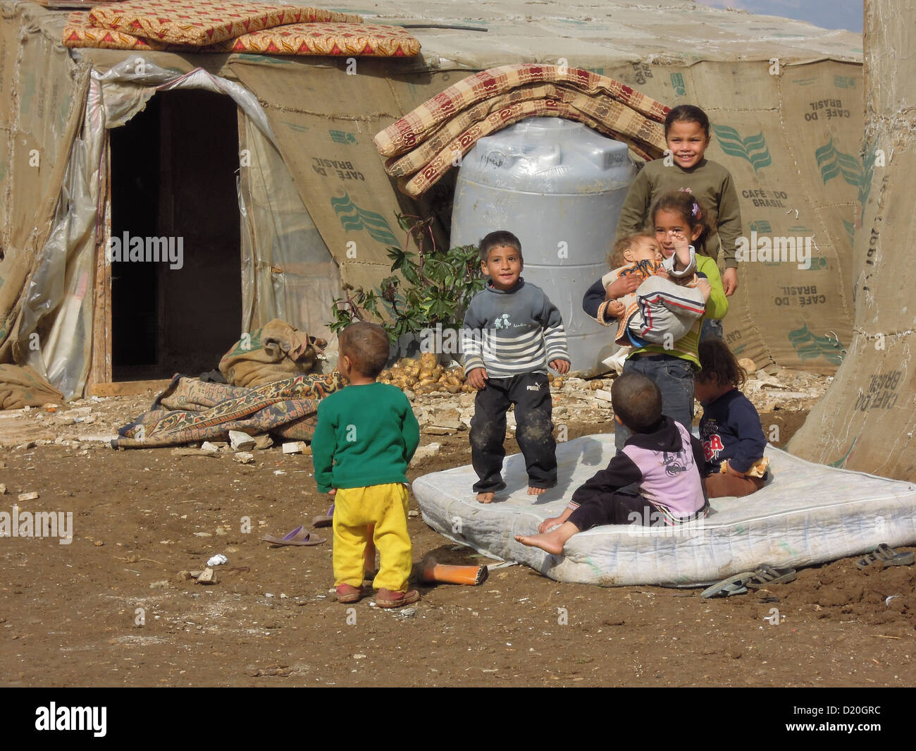 Syrian refugee children playing in a camp in the south of Lebanon Stock ...